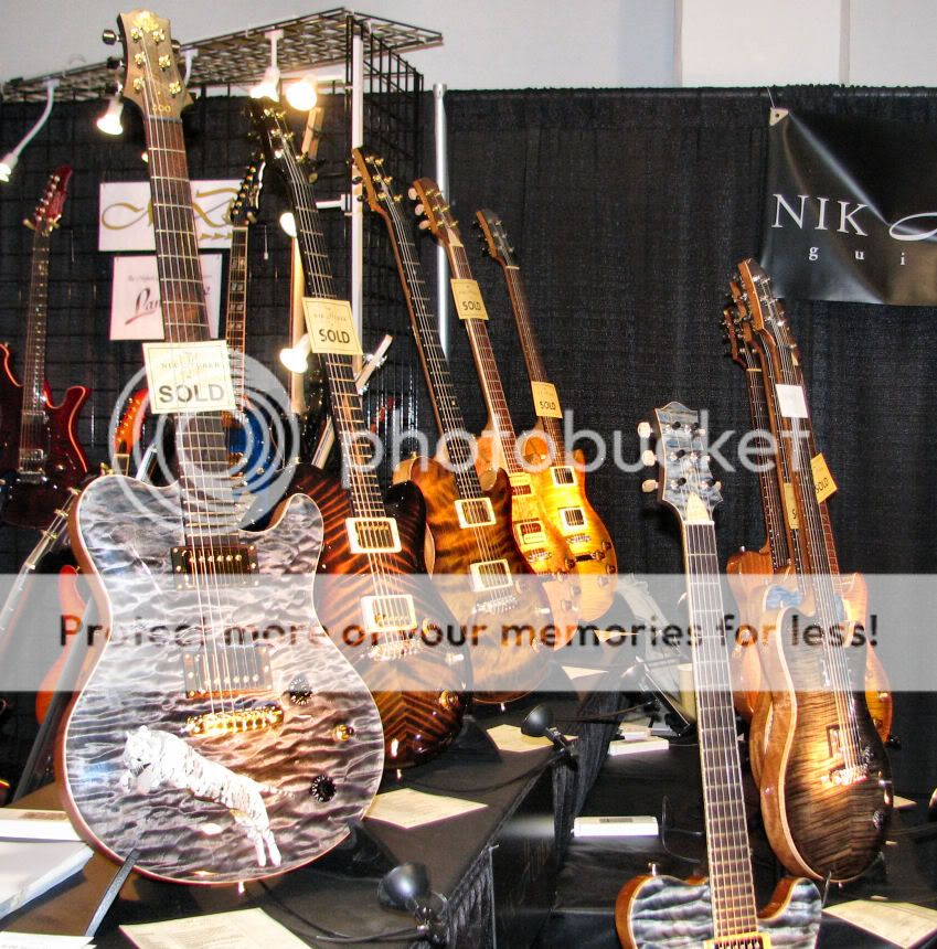 Nik Huber's Display at NAMM. Check out the inlay on the tops ...