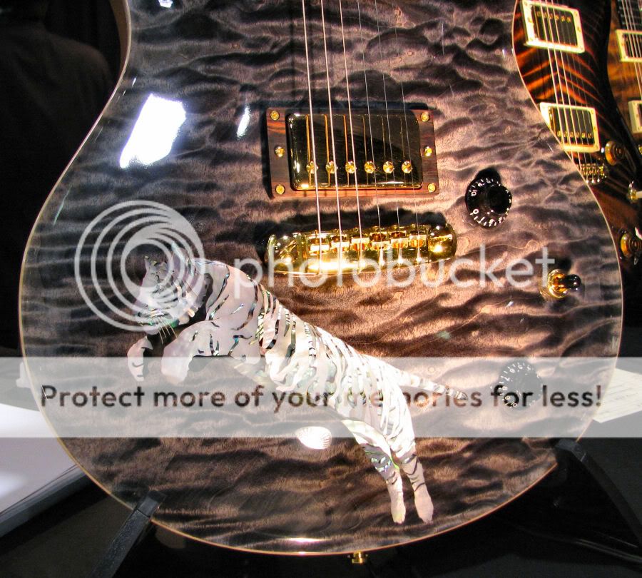 Nik Huber's Display at NAMM. Check out the inlay on the tops ...